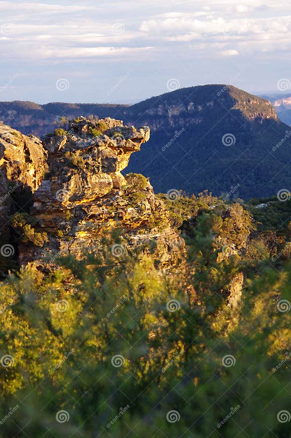 Boars Head Rock at sunset stock photo. Image of light - 16786160
