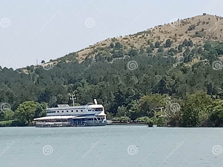 Boat stock image. Image of trees, pake, blue, boat, people - 152649367