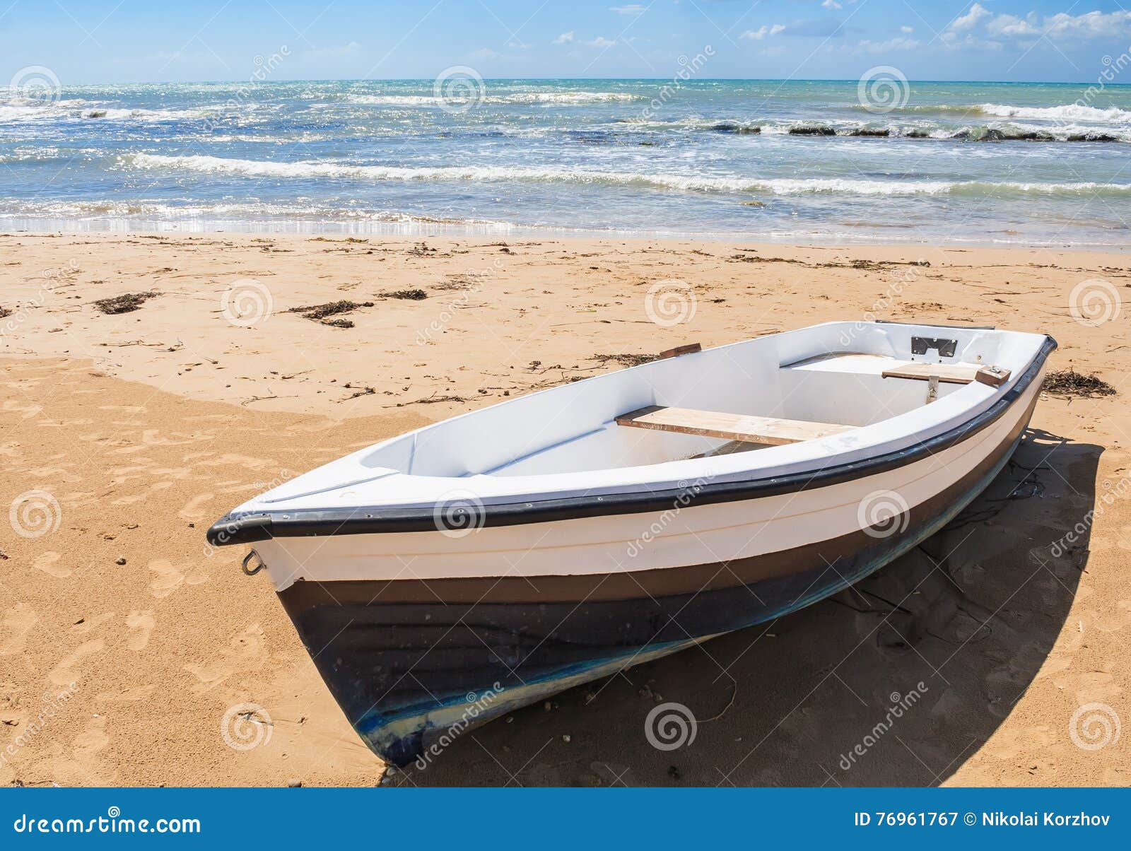 Boat on the beach stock image. Image of water, yacht - 76961767