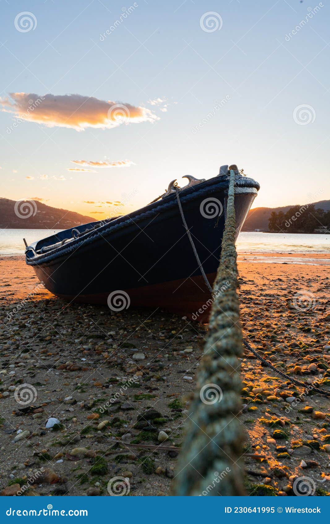Boat Beached on the Sand of the Beach. Stock Image - Image of coastal ...