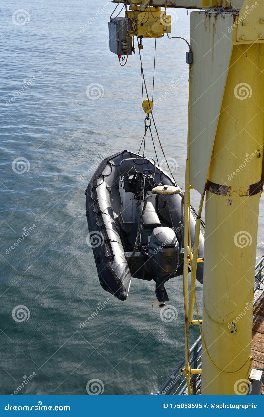 Boat Being Hoisted from Ocean Stock Image - Image of nautical, seascape ...