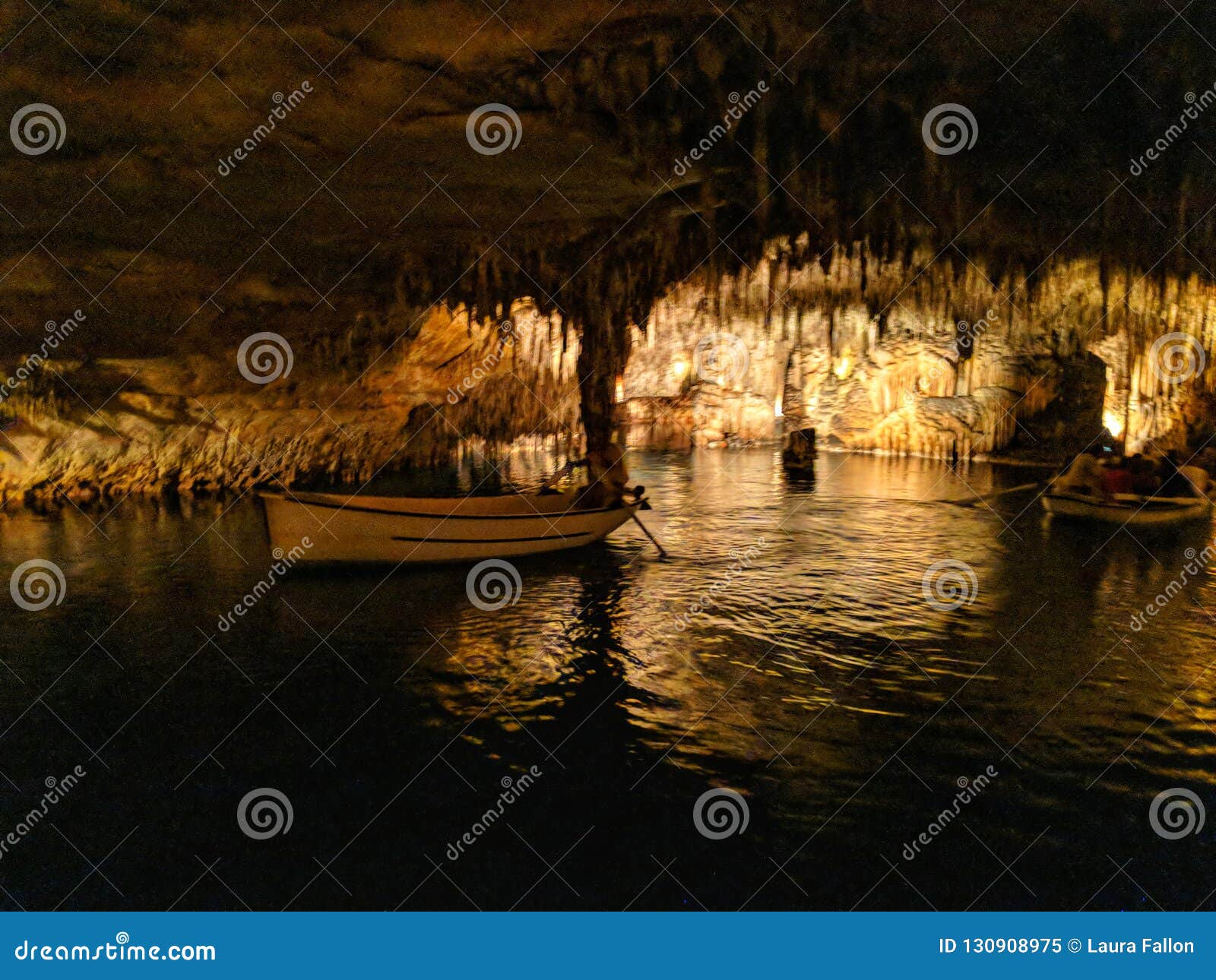 Boat in the caves stock image. Image of caves, majorca - 130908975