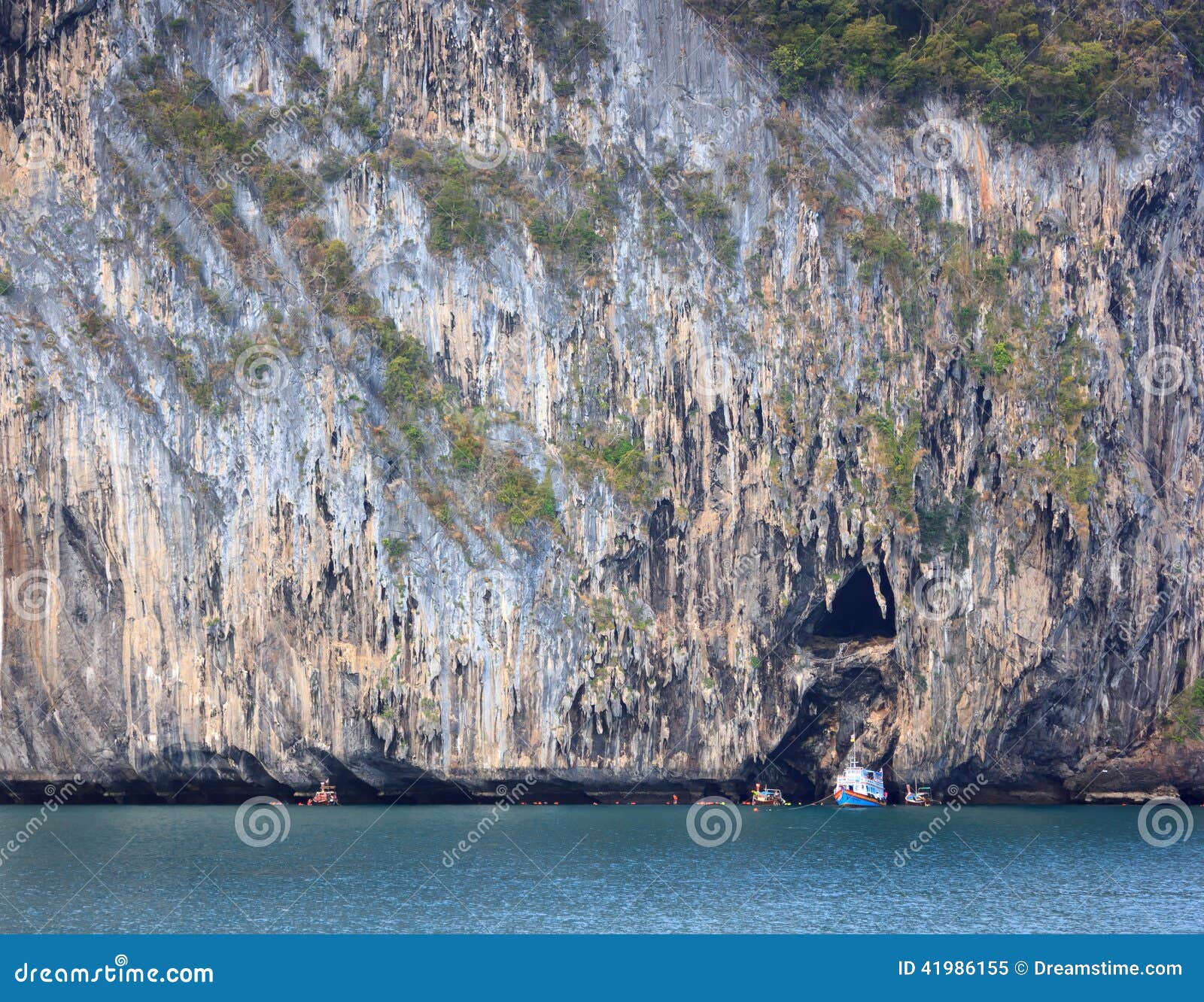 Boat and cliff stock image. Image of coast, cliff, calm - 41986155
