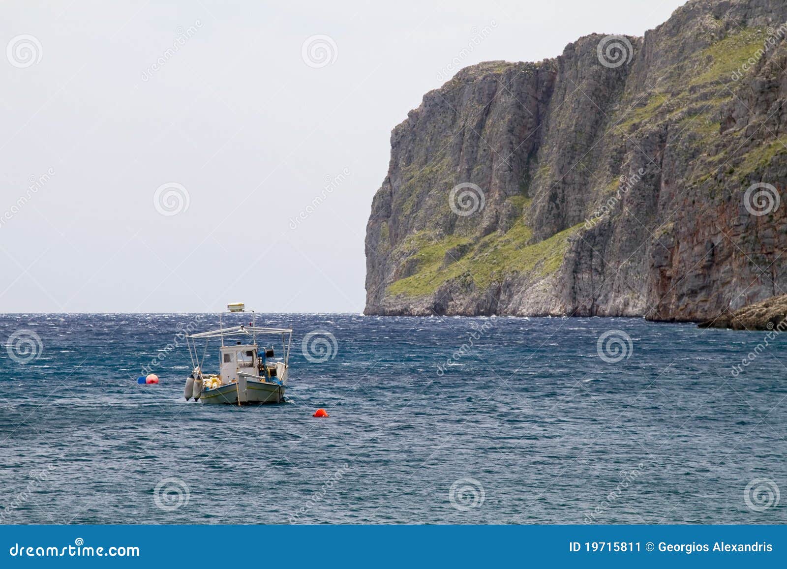 Boat and Cliffs stock image. Image of cliffs, fishing - 19715811