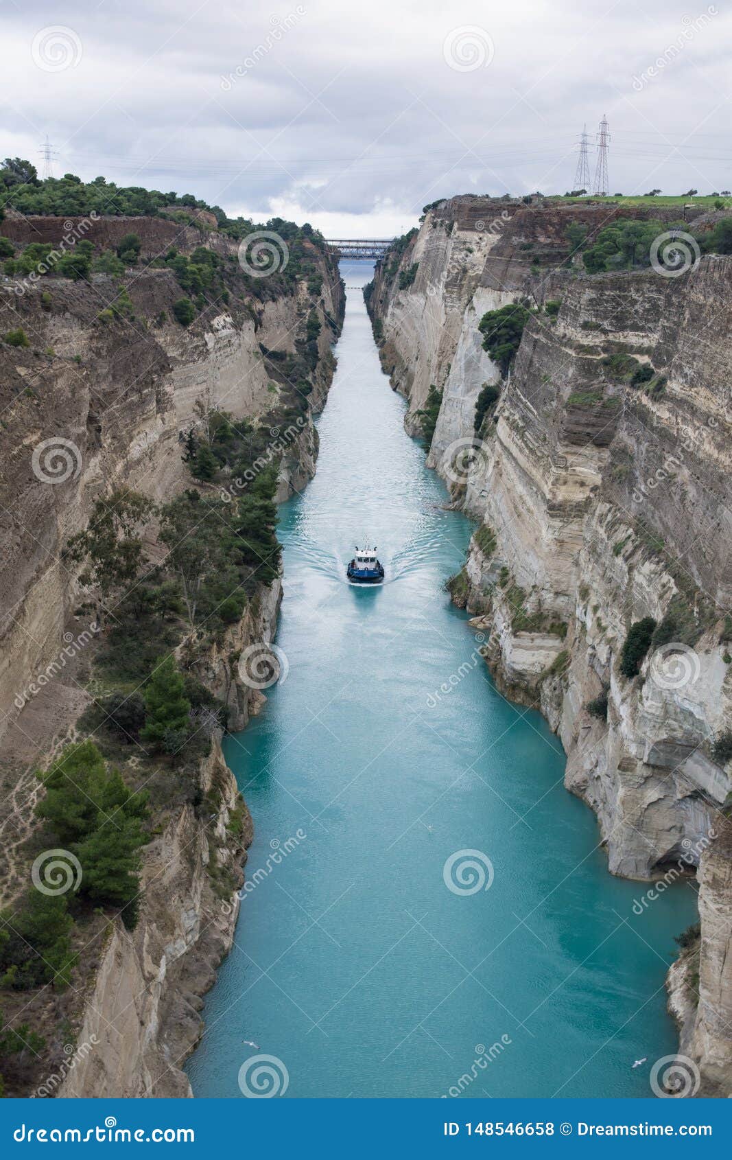 Boat in Corinth Canal and Heavy Clouds Stock Photo - Image of corinth ...