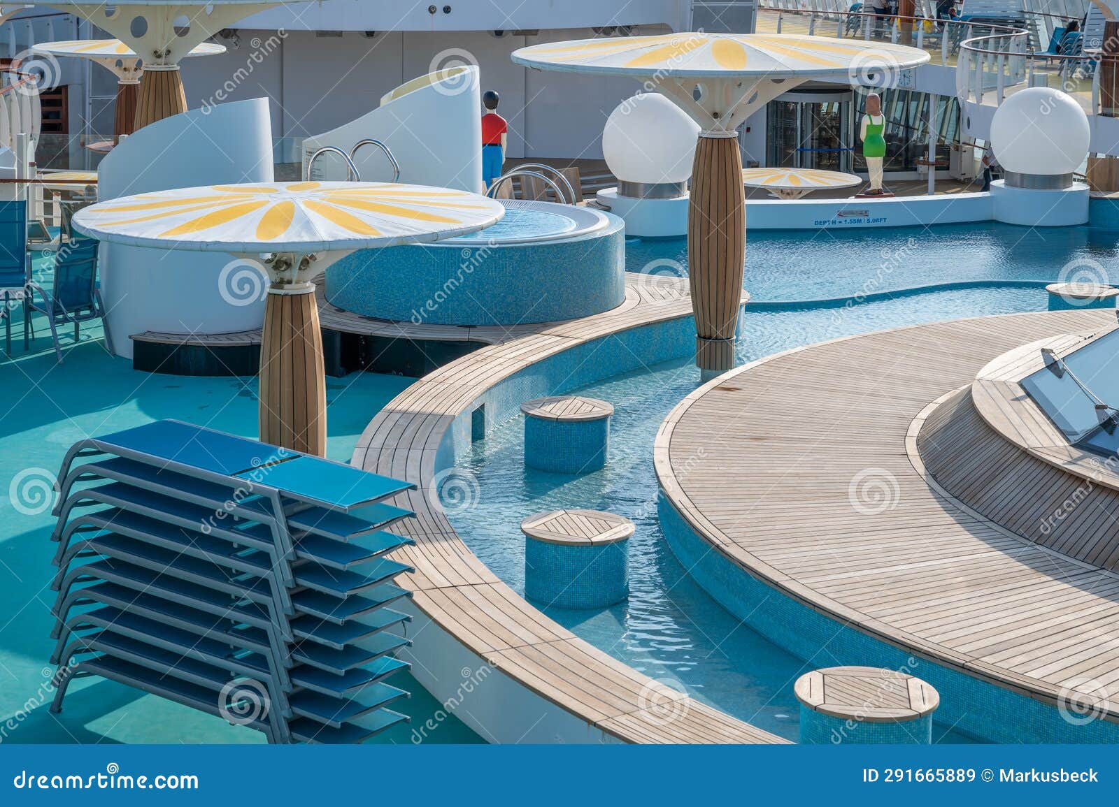 Boat Deck of AIDA Bella Cruise Ship with Stacked Deck Chairs and a Pool ...