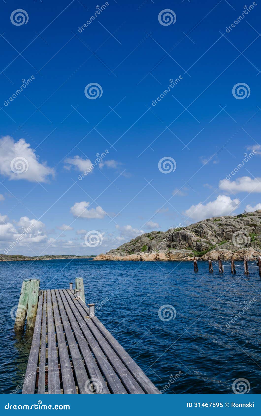 Boat Dock and Cliffs in the Background Stock Image - Image of boat ...