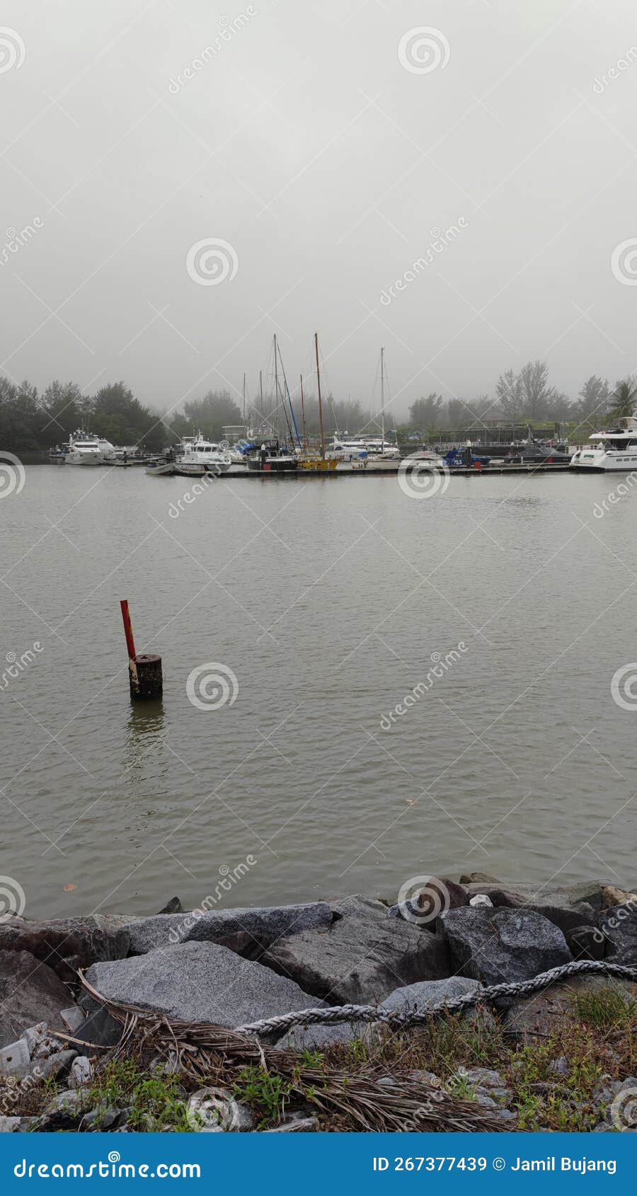 Boat Docked during Raining Season Stock Image - Image of shore, morning ...