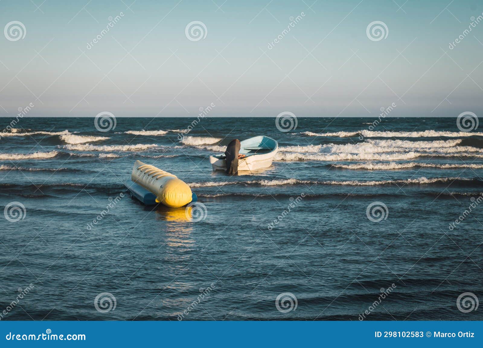 Boat with an Inflatable Float on the Sea Waves Stock Image - Image of ...