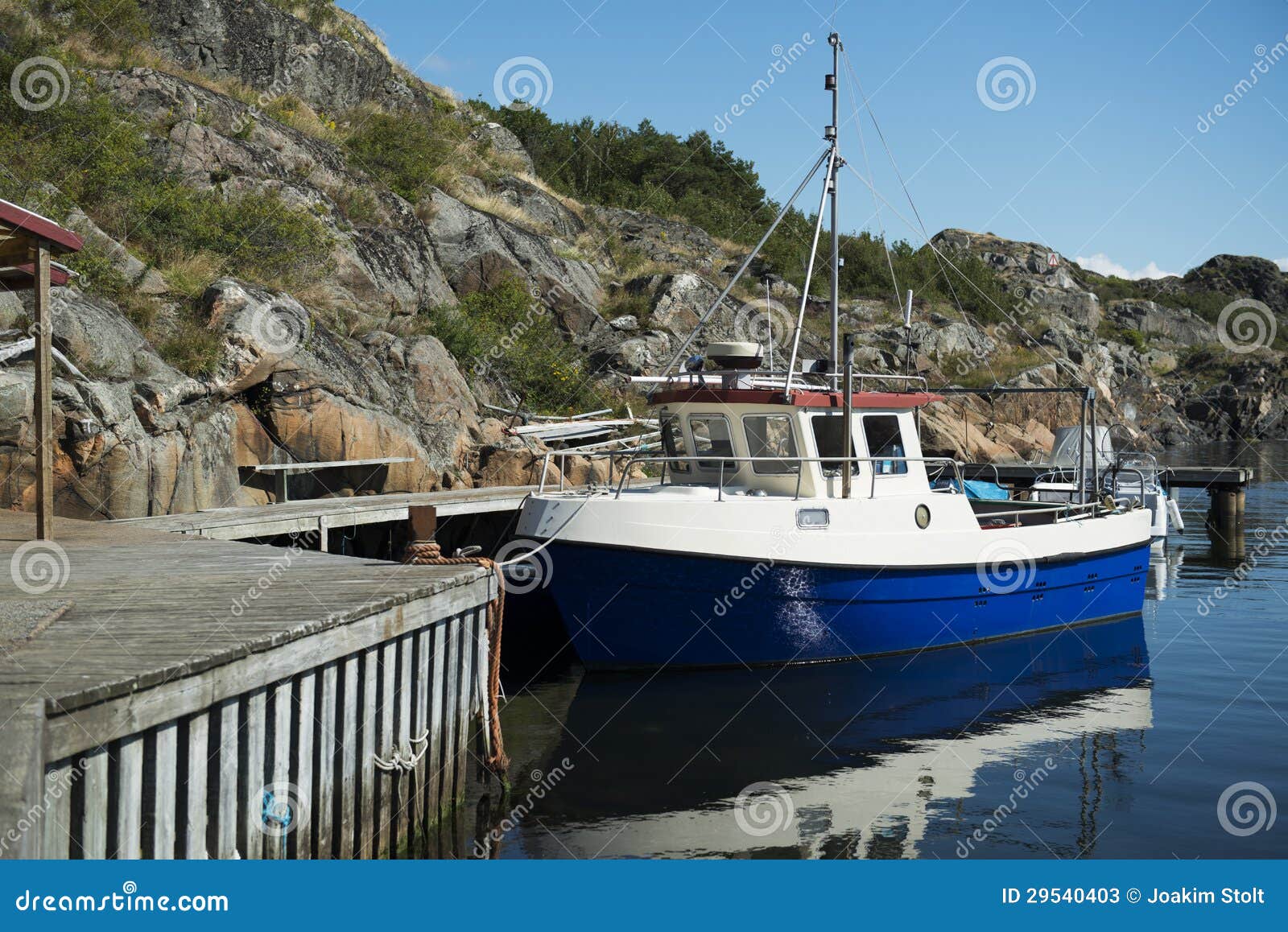 Boat at jetty by the sea stock image. Image of nature - 29540403