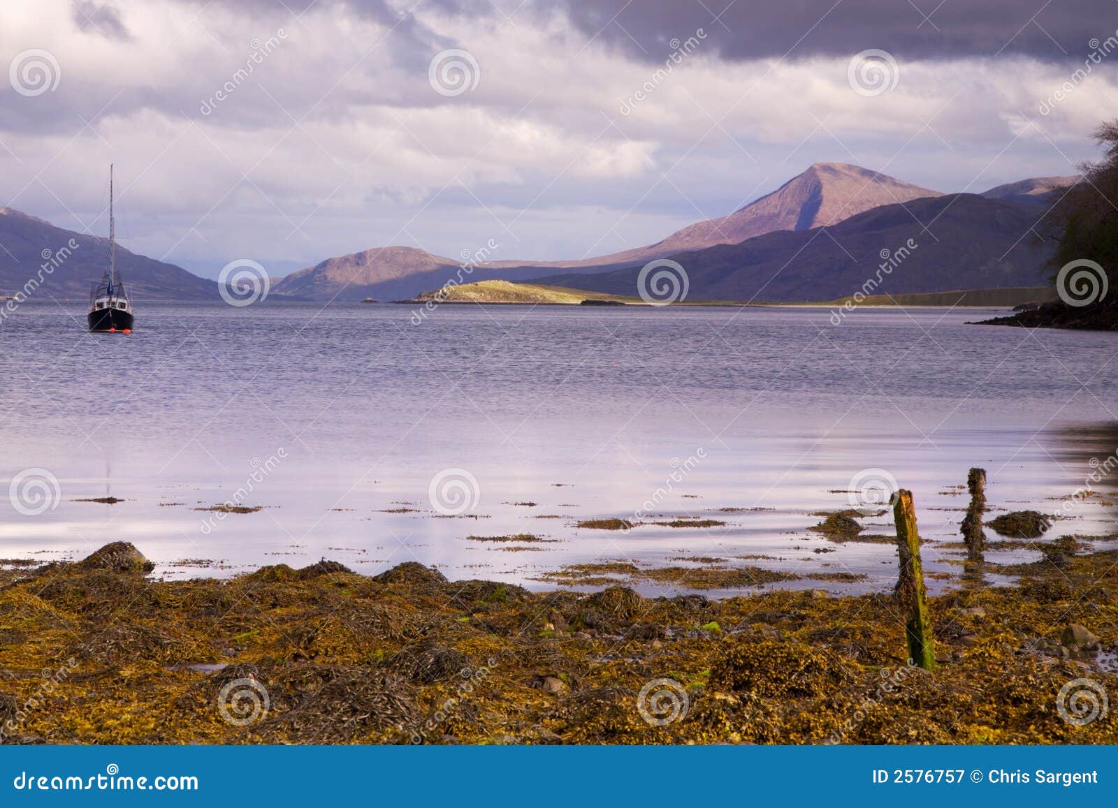 Boat on Lake with Mountains Stock Image - Image of mist, lush: 2576757