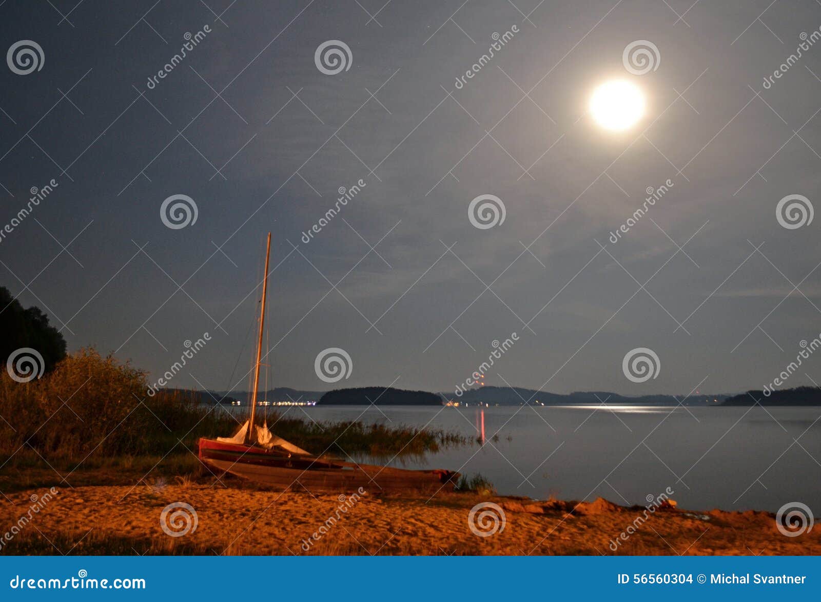 Boat on a Lake Shore at Night in the Moonlight Stock Photo - Image of ...