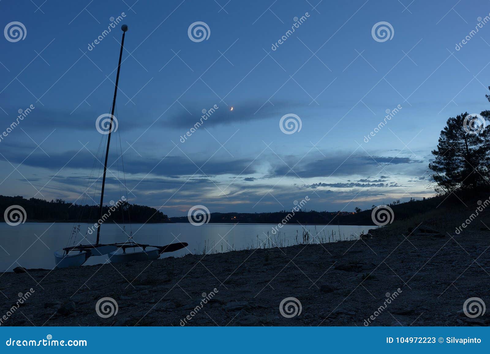 Boat on Lake Shore at Night. Stock Image - Image of cloud, light: 104972223