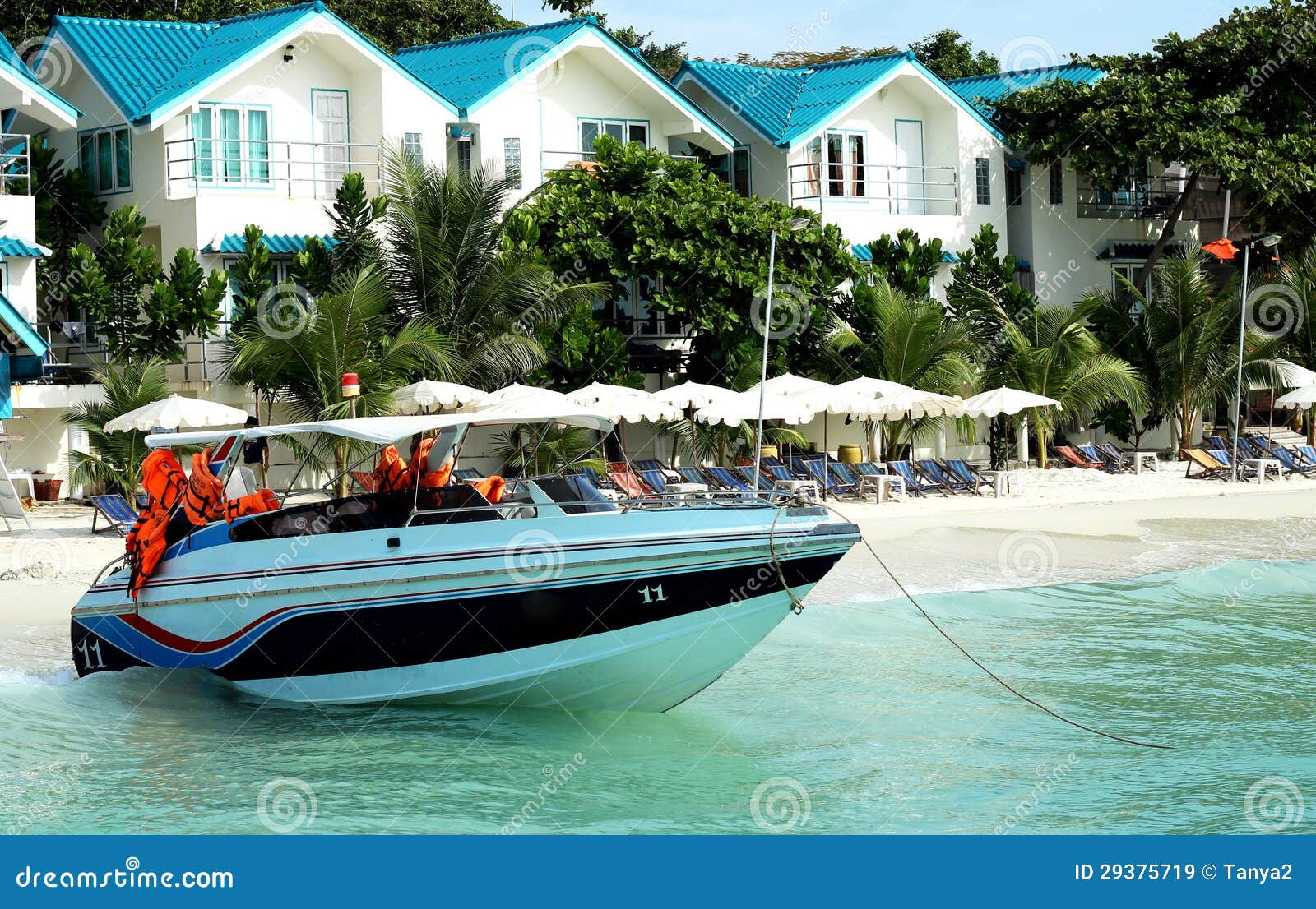 Boat with life jackets stock image. Image of water, houses - 29375719