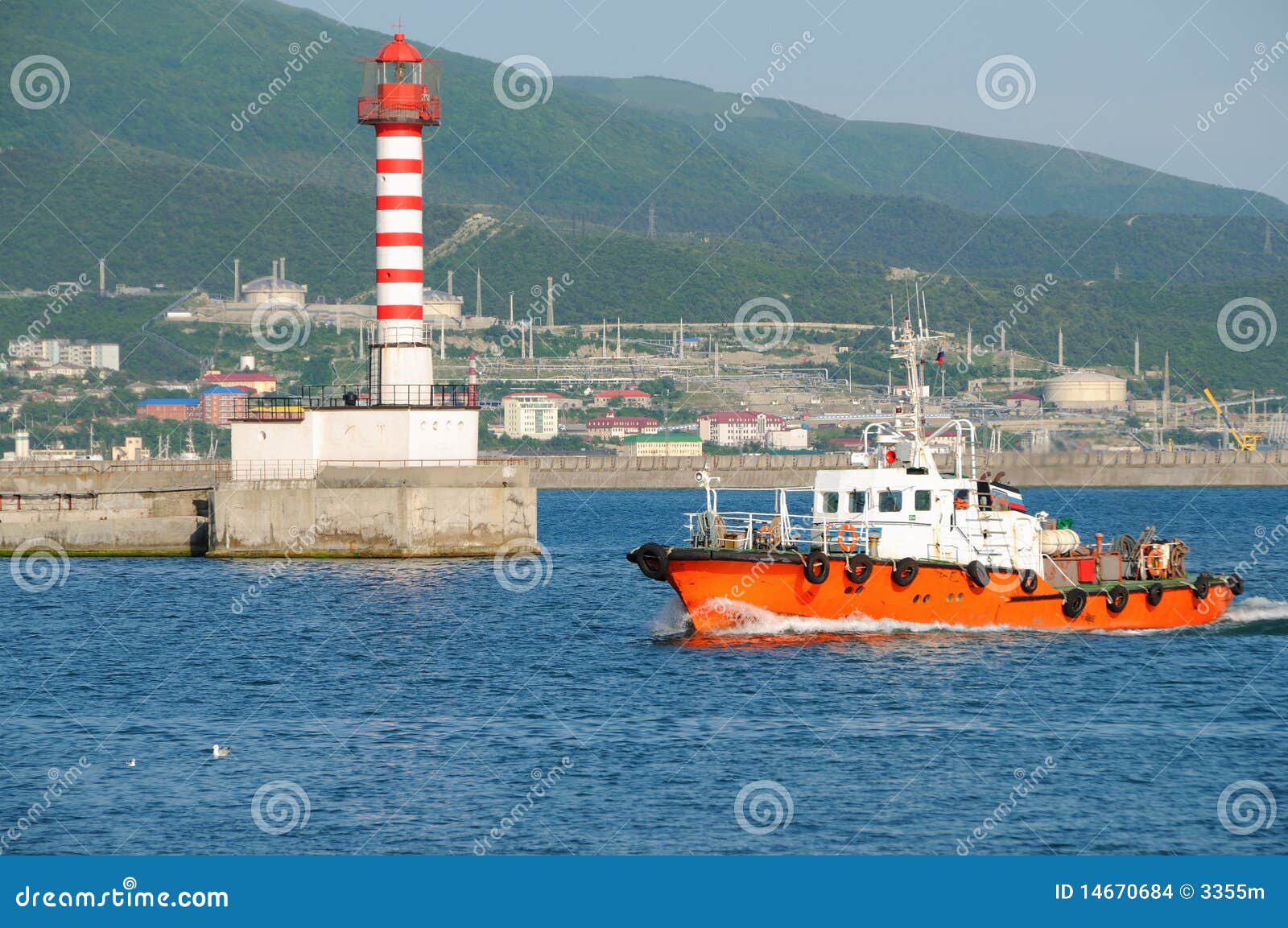Boat & lighthouse stock photo. Image of city, seascape - 14670684