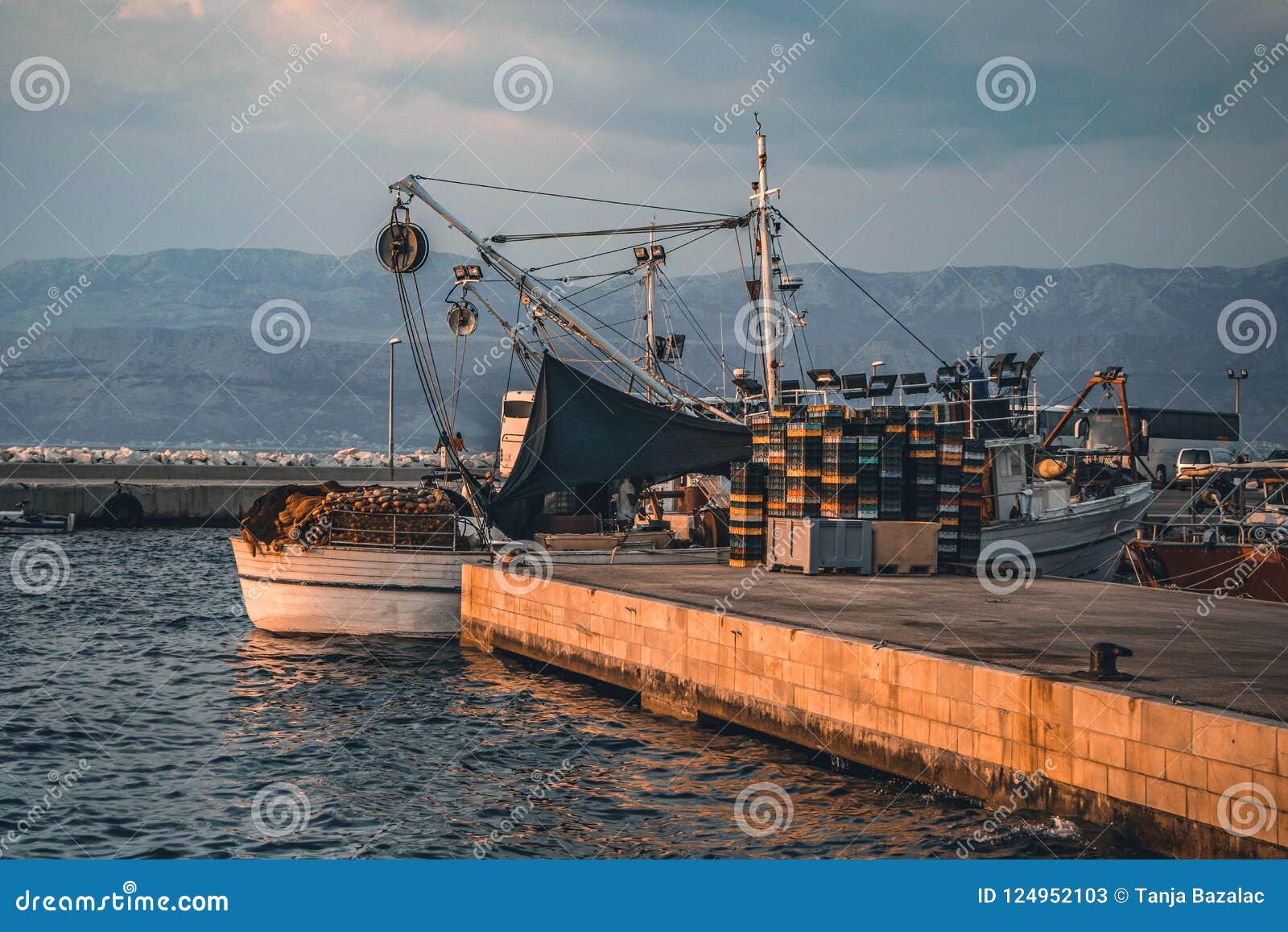 Boat on a loading dock stock image. Image of brac, island - 124952103