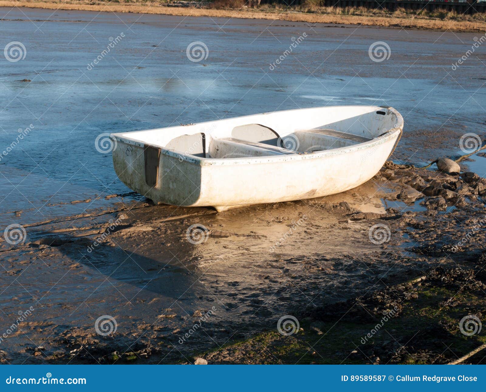 Boat in the Mud with the Tide Out Stock Image - Image of horizon ...