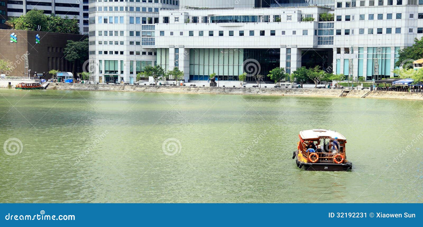 A Boat is Navigating the Singapore River Editorial Photo - Image of ...