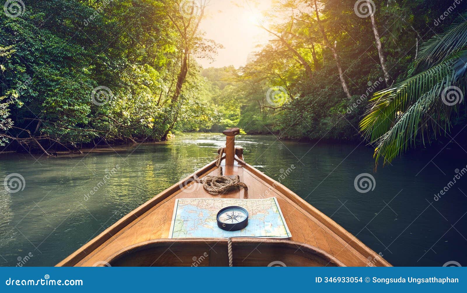 Boat Navigating a Tropical River with a Map and Compass on the Deck ...