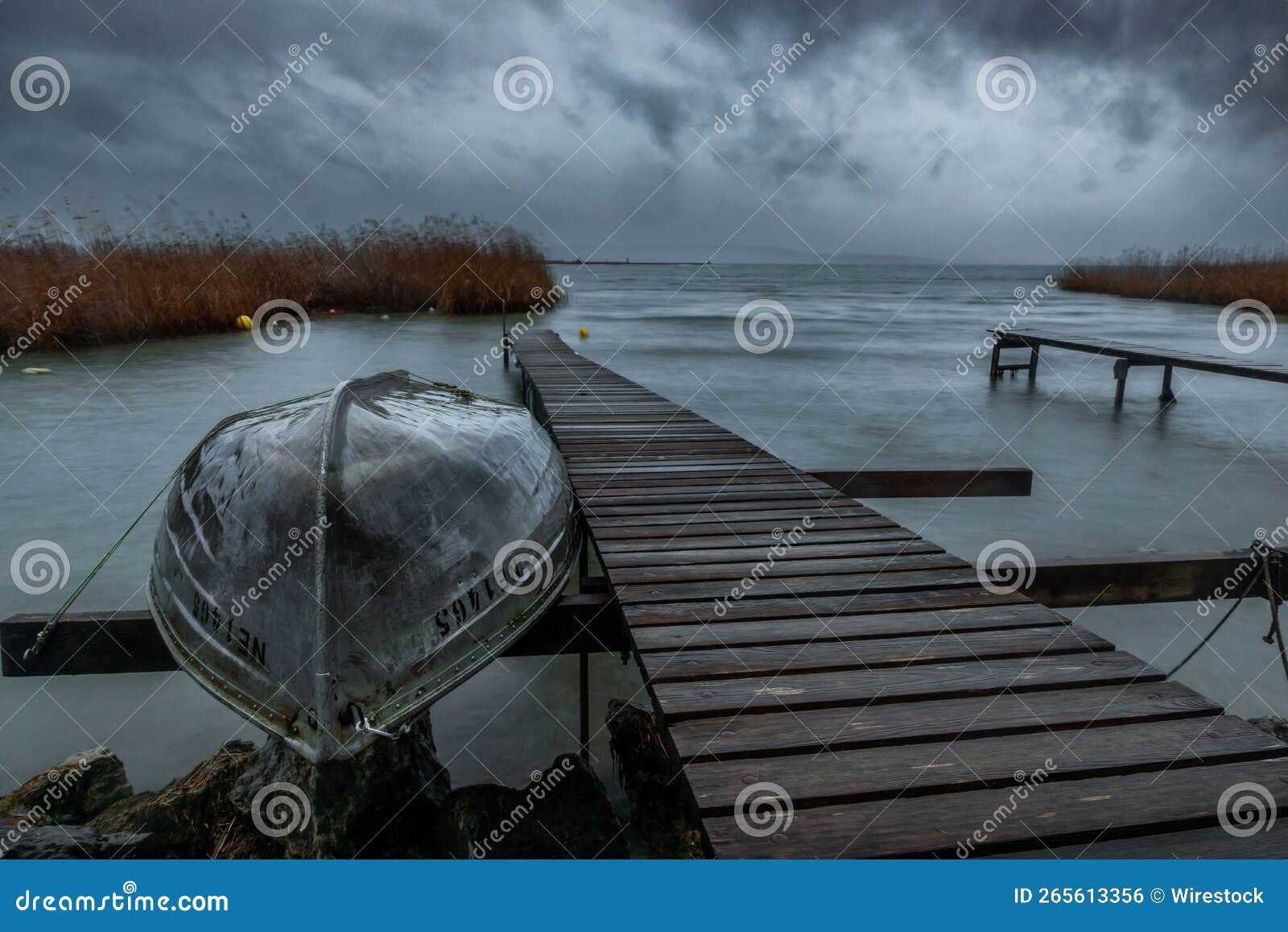 Boat Turned Over in the Storm Stock Photo - Image of natural, nature ...