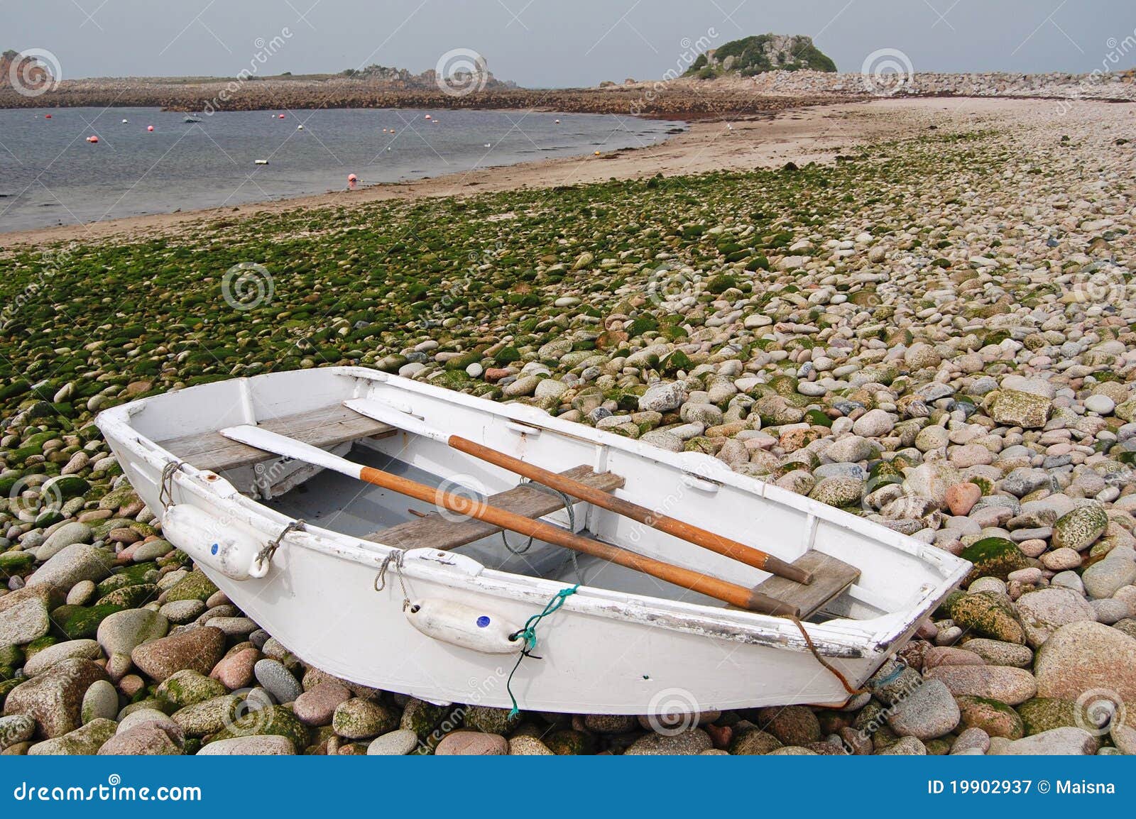 Boat on pebble beach stock image. Image of escape, boat - 19902937