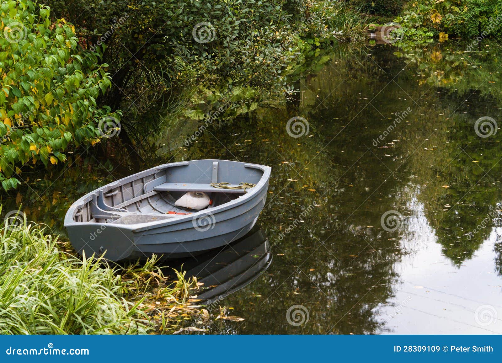 Boat on a pond stock image. Image of grey, foliage, color - 28309109