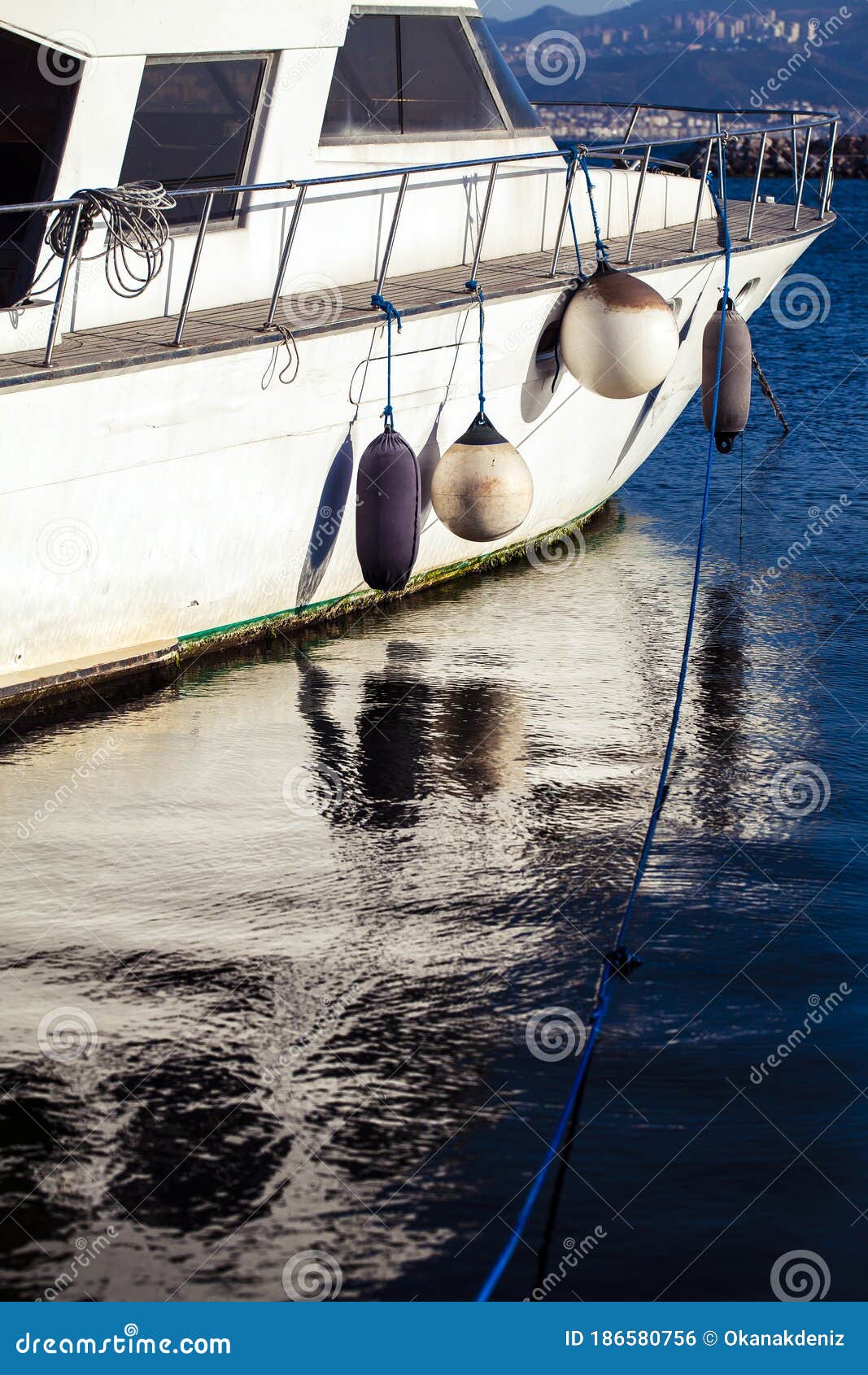 A Boat Reflection on Sea Water Stock Photo - Image of blue, sail: 186580756