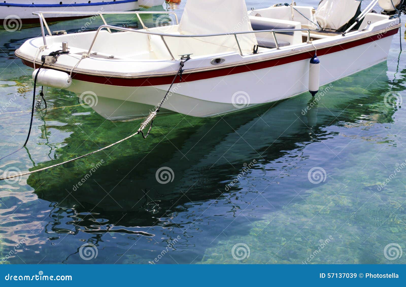 Boat reflection on water stock image. Image of sunlight - 57137039