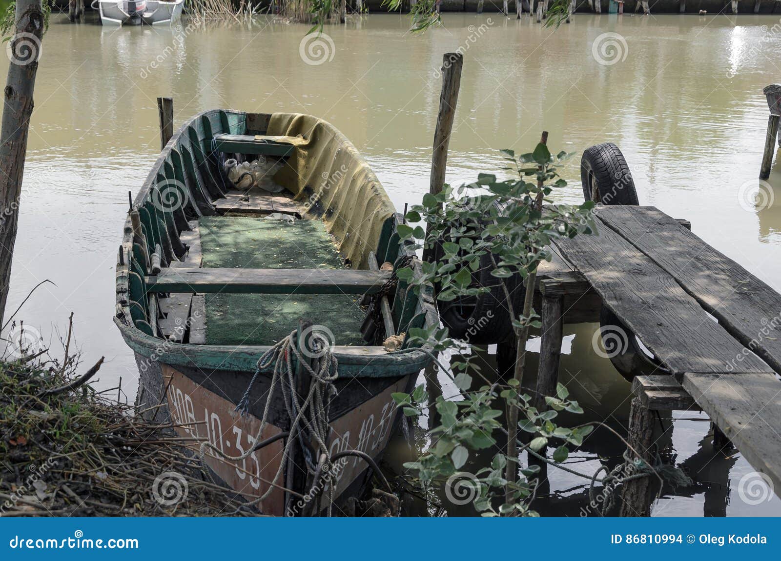 Boat by the riverside stock photo. Image of boat, riverside - 86810994