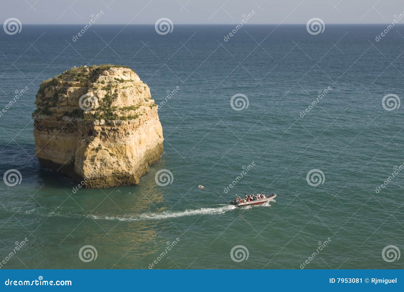 Boat and rock stock image. Image of beach, clouds, tourism - 7953081
