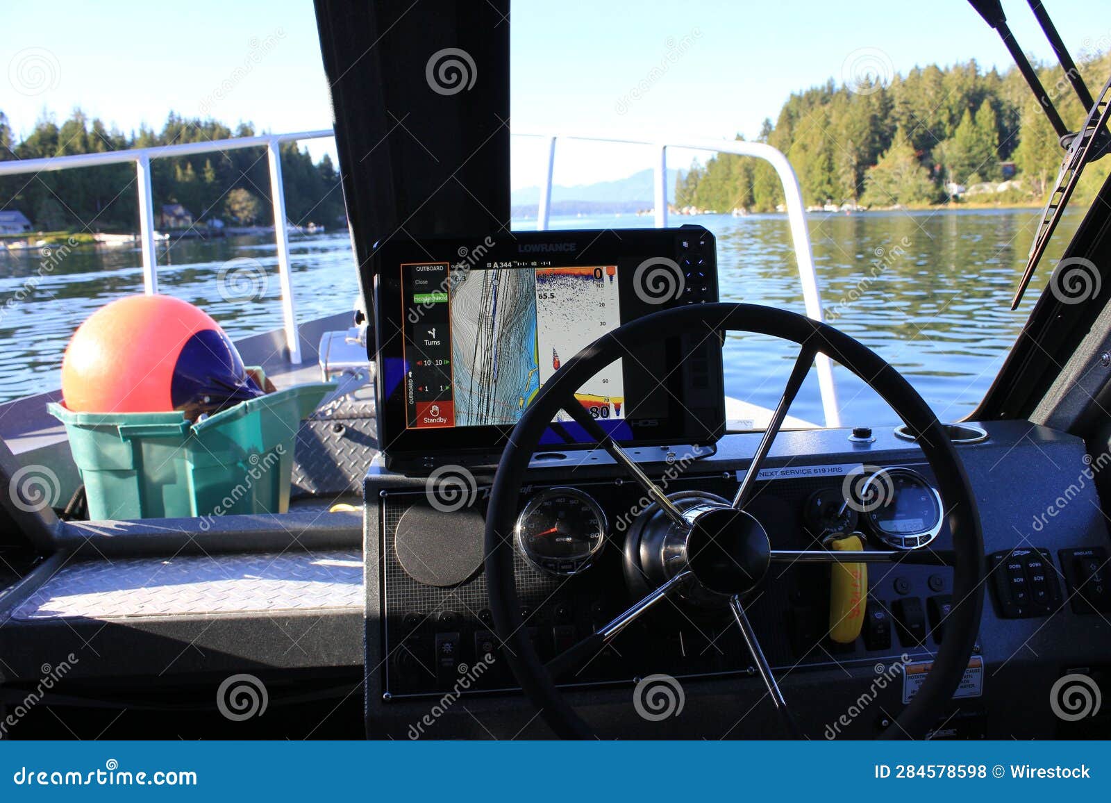 Boat S Wheel, with a Navigation System Screen. Editorial Stock Photo ...