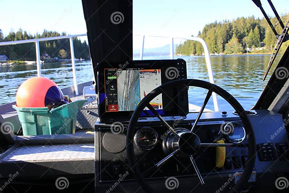Boat S Wheel, with a Navigation System Screen. Editorial Stock Photo ...