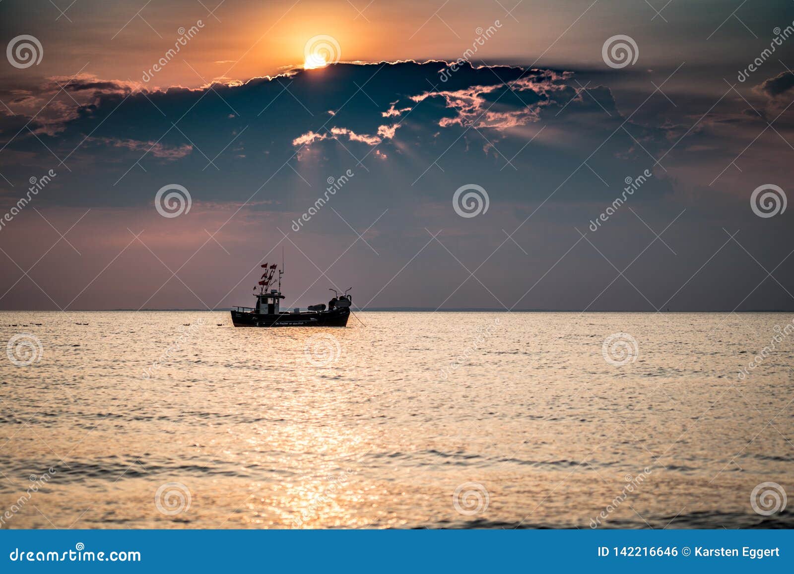 A Boat on the Sea at Sunrise Stock Photo - Image of sunset, summer ...