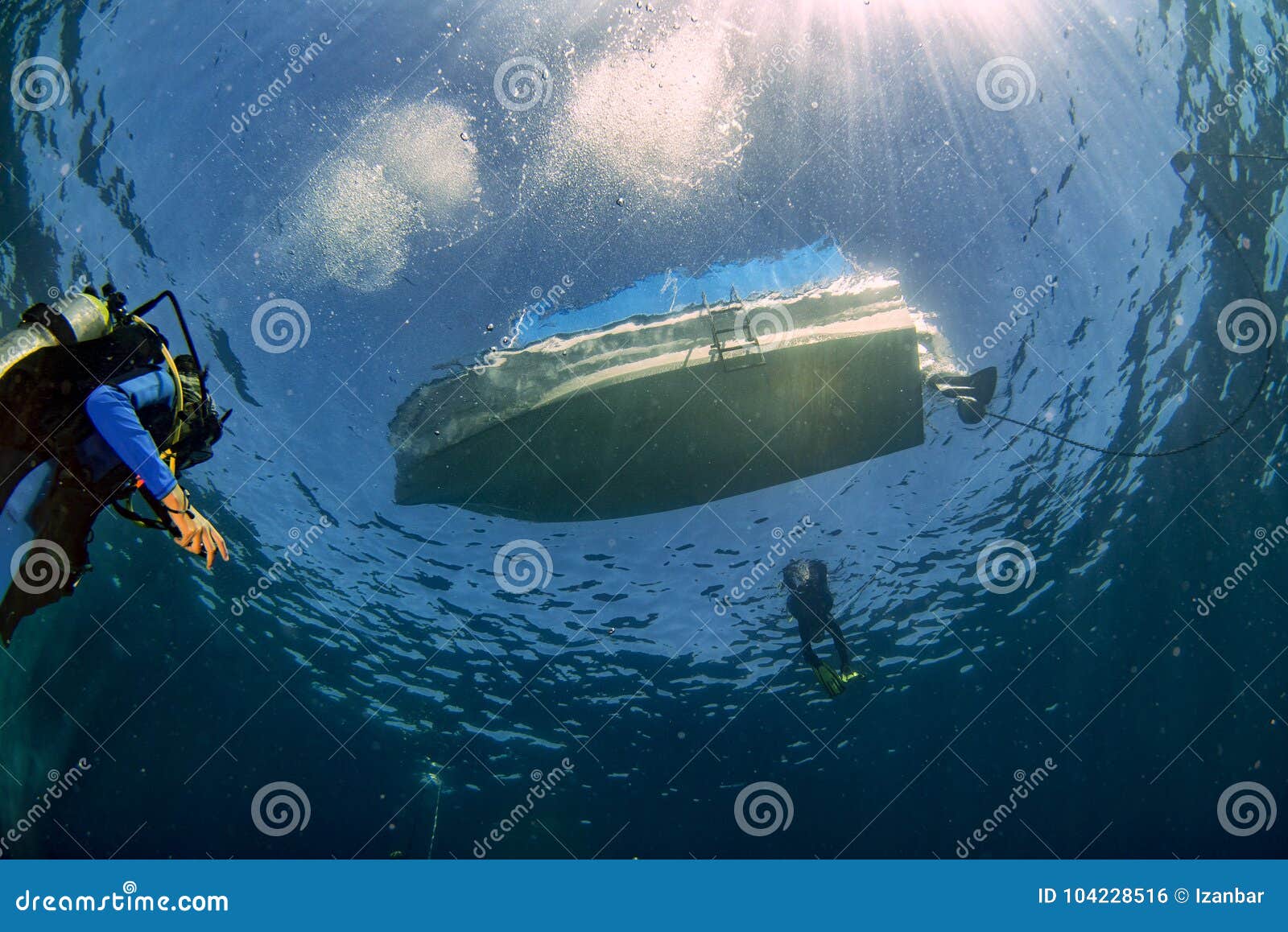 Boat Ship from Underwater Blue Ocean with Sun Rays Stock Photo - Image ...