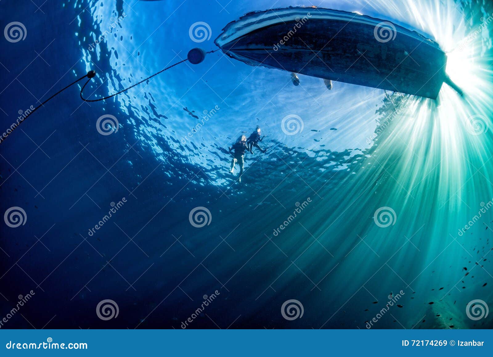 Boat Ship from Underwater Blue Ocean with Sun Rays Stock Image - Image ...