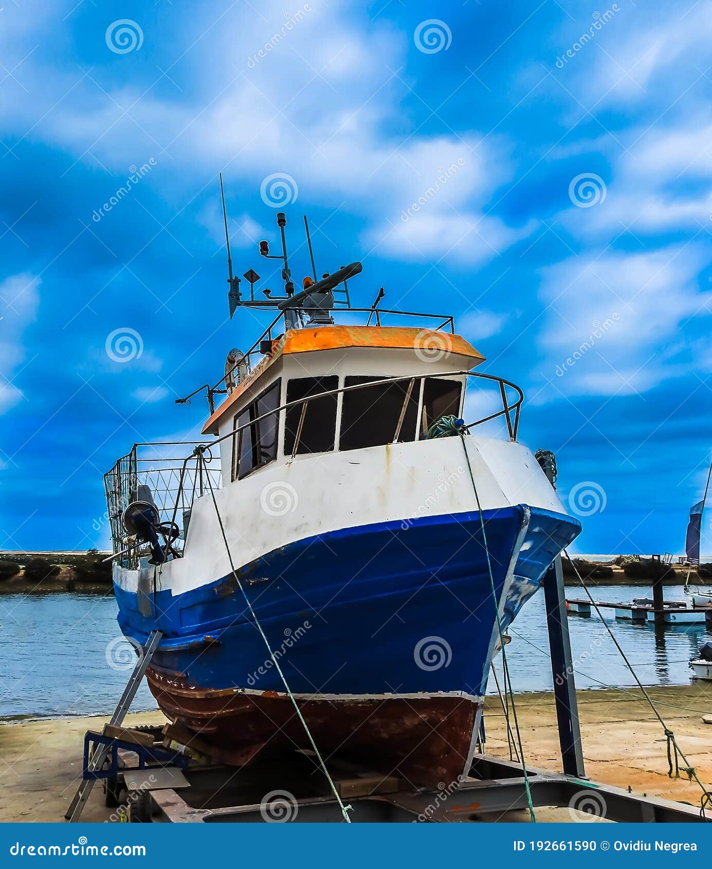 Boat on the Shore by the Water Stock Photo - Image of color, leaving ...