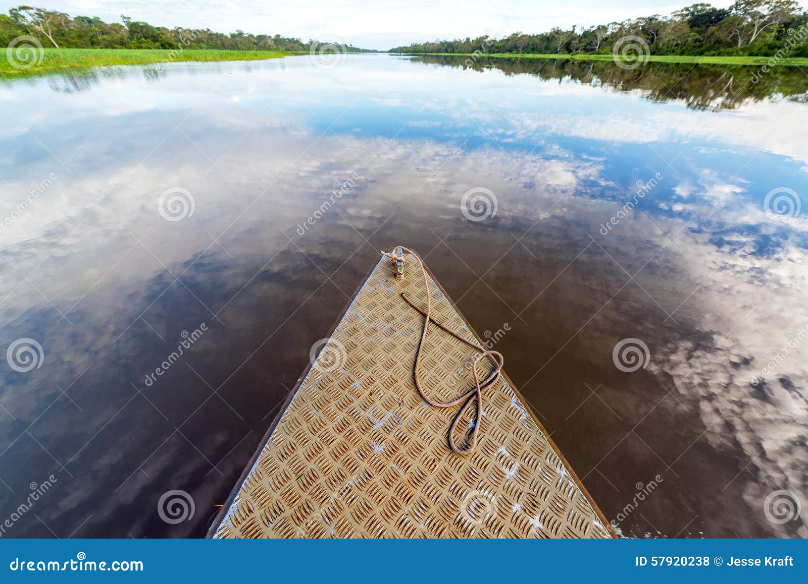 Boat and Sky Reflection stock photo. Image of rainforest - 57920238