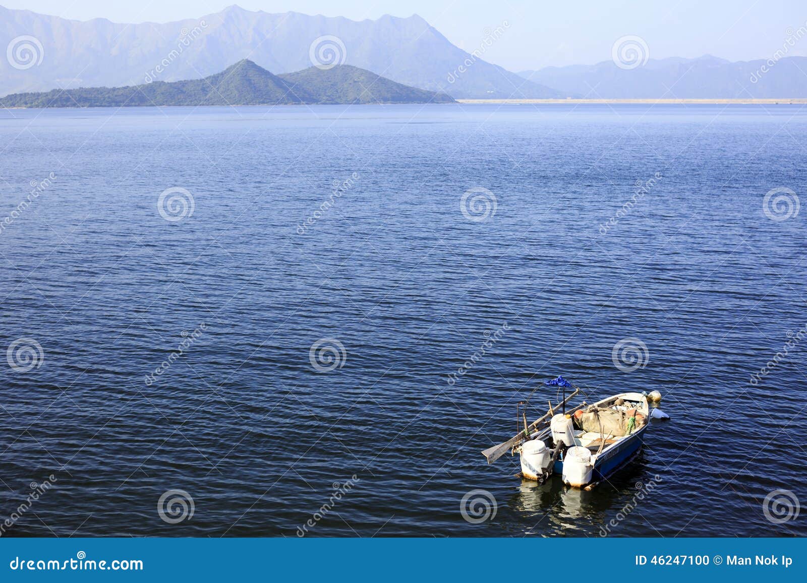 The Boat Stays on a Peaceful Sea Stock Photo - Image of lakes, wave ...