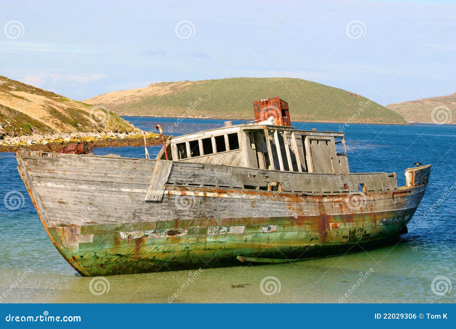 Boat stranded on the beach stock photo. Image of transportation - 22029306