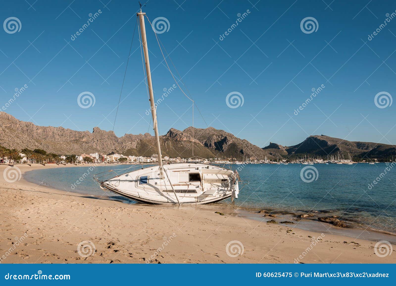 Boat stranded on the beach stock image. Image of mediterranean - 60625475