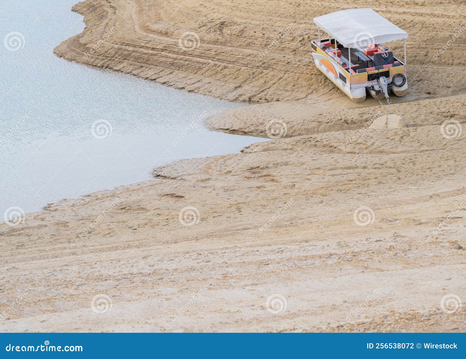 Boat Stranded on a Lake Shore in Dry Season Stock Photo - Image of sand ...