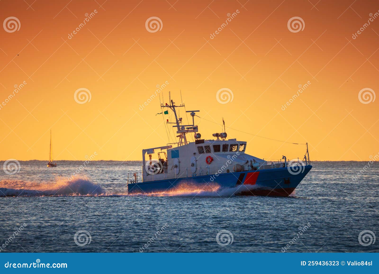 Sailing Fishing or Patrol Boat and Sunrise, Beautiful Cloudscape Over ...