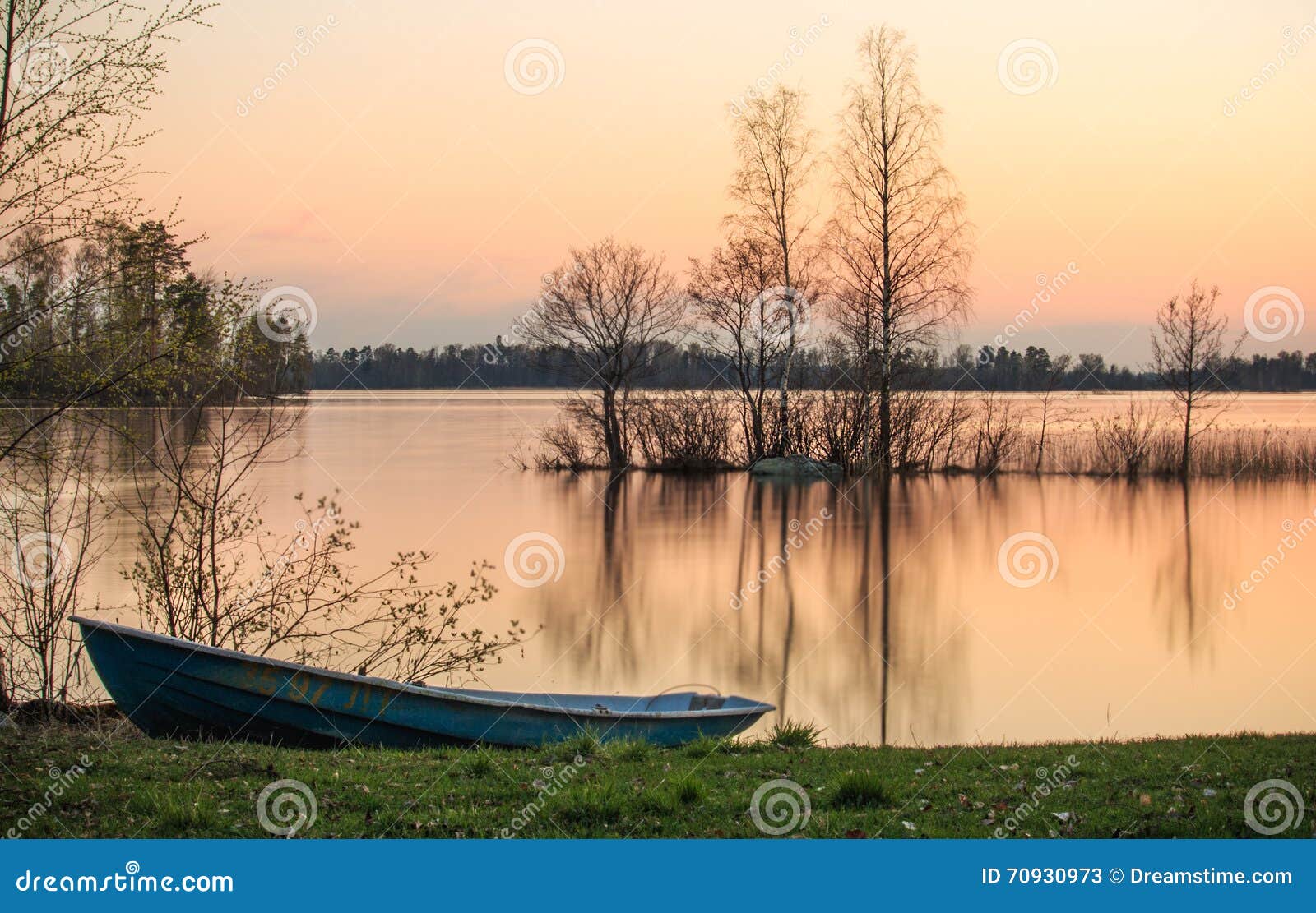 Boat at sunset on the lake stock image. Image of vuoksa - 70930973
