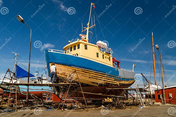 Boat under repair stock photo. Image of marina, worn - 48500256
