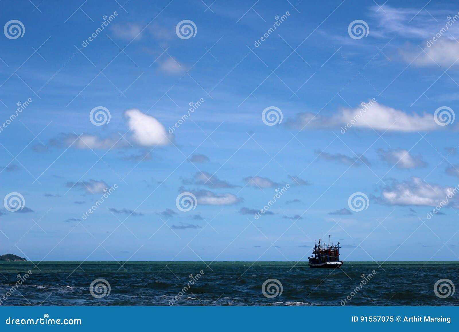 A boat on a vast ocean stock image. Image of blue, freedom - 91557075