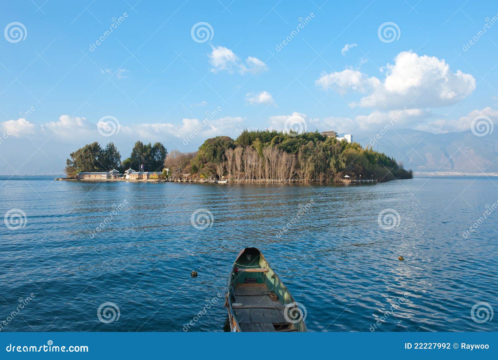 Boat, village and lake stock photo. Image of island, dali - 22227992