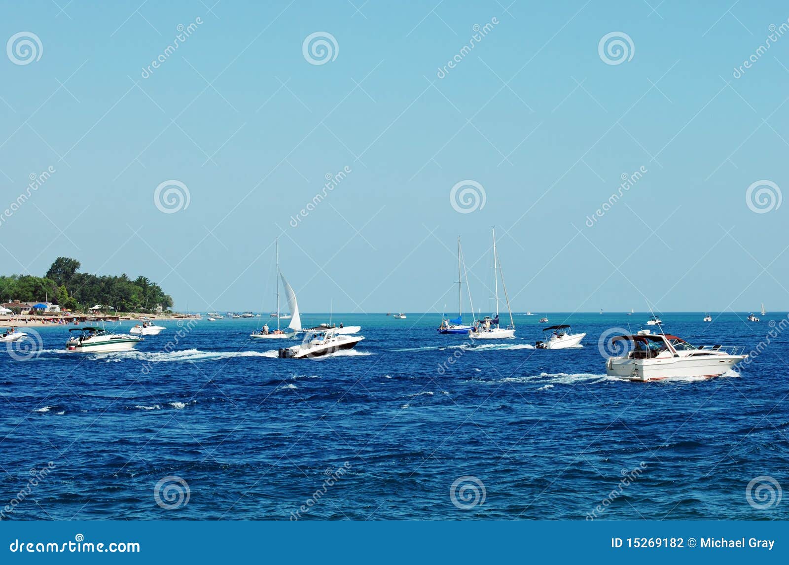 Boating in a busy lake stock photo. Image of race, purple - 15269182