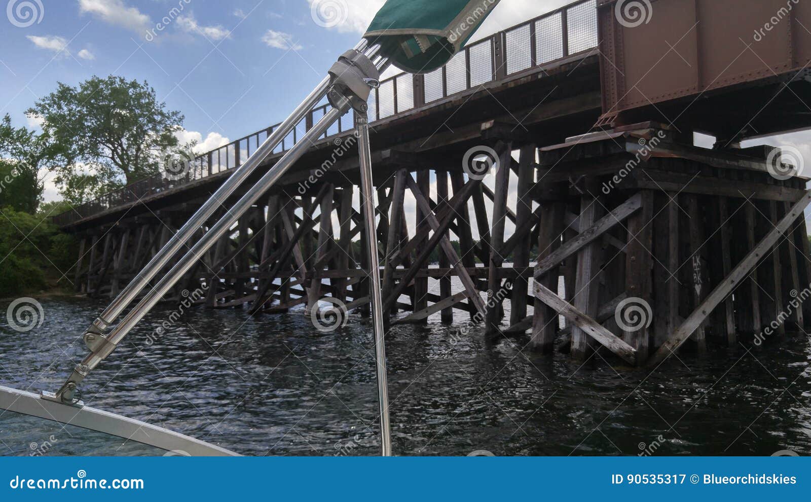 Boating on Lake Under Wooden Bridge Stock Image - Image of lake, wooden ...