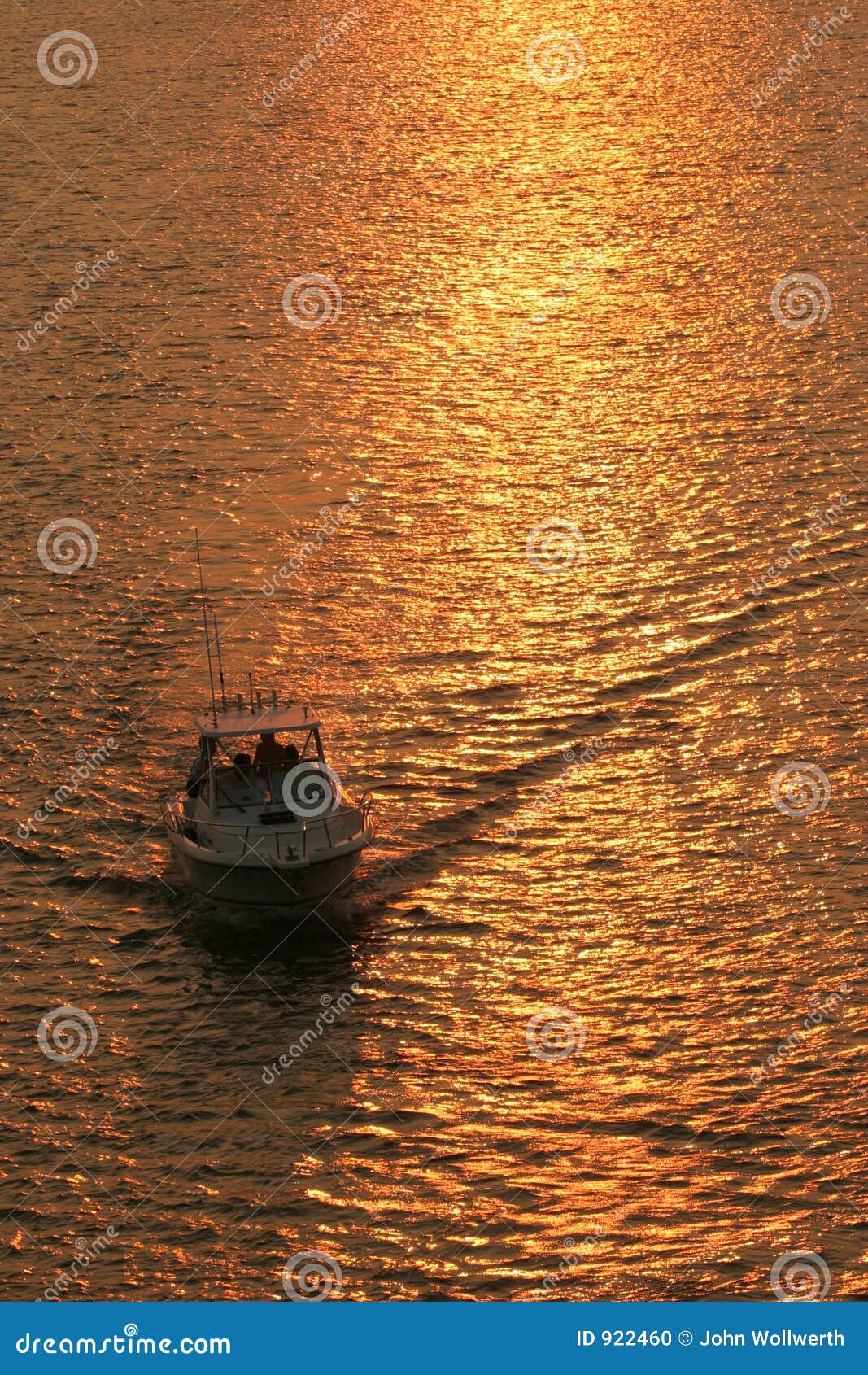 Boating at sunset stock photo. Image of reflection, wake - 922460