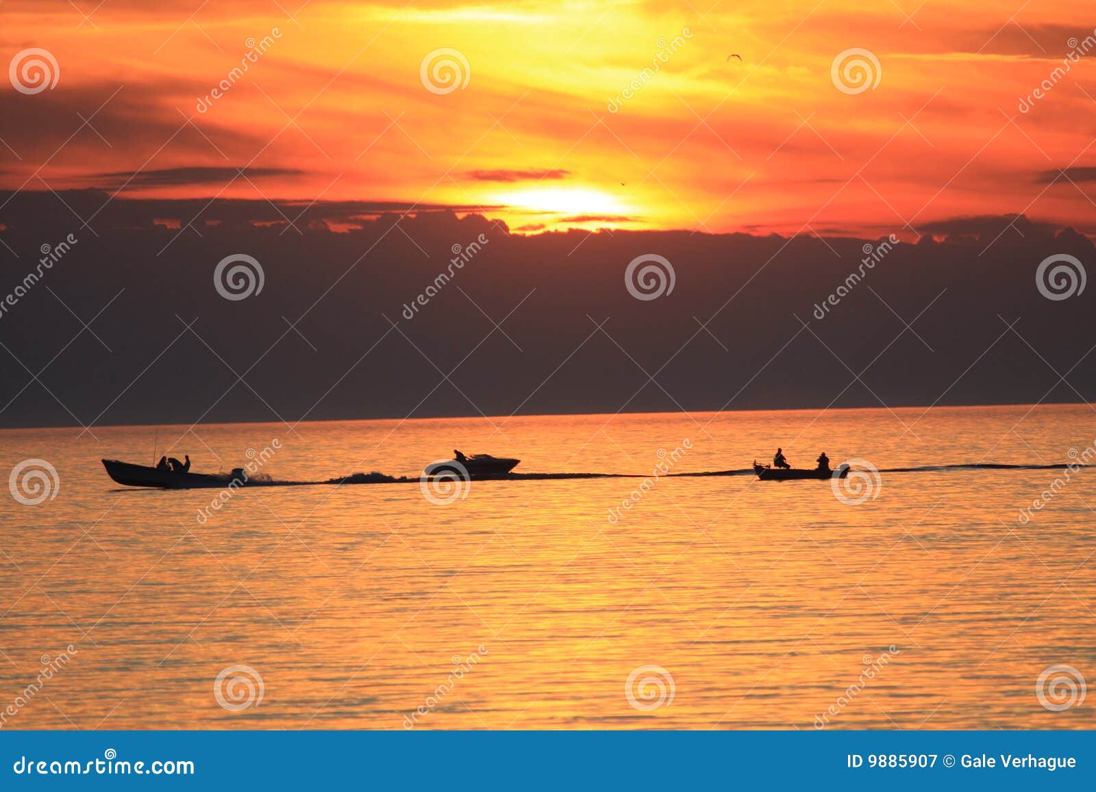 Boating at Sunset stock image. Image of dusk, calm, motorboat - 9885907